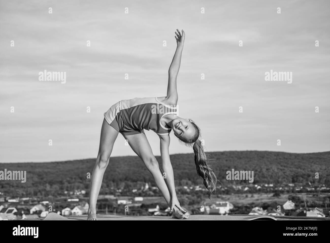 back to school. physical training. athletic child has flexible body ...