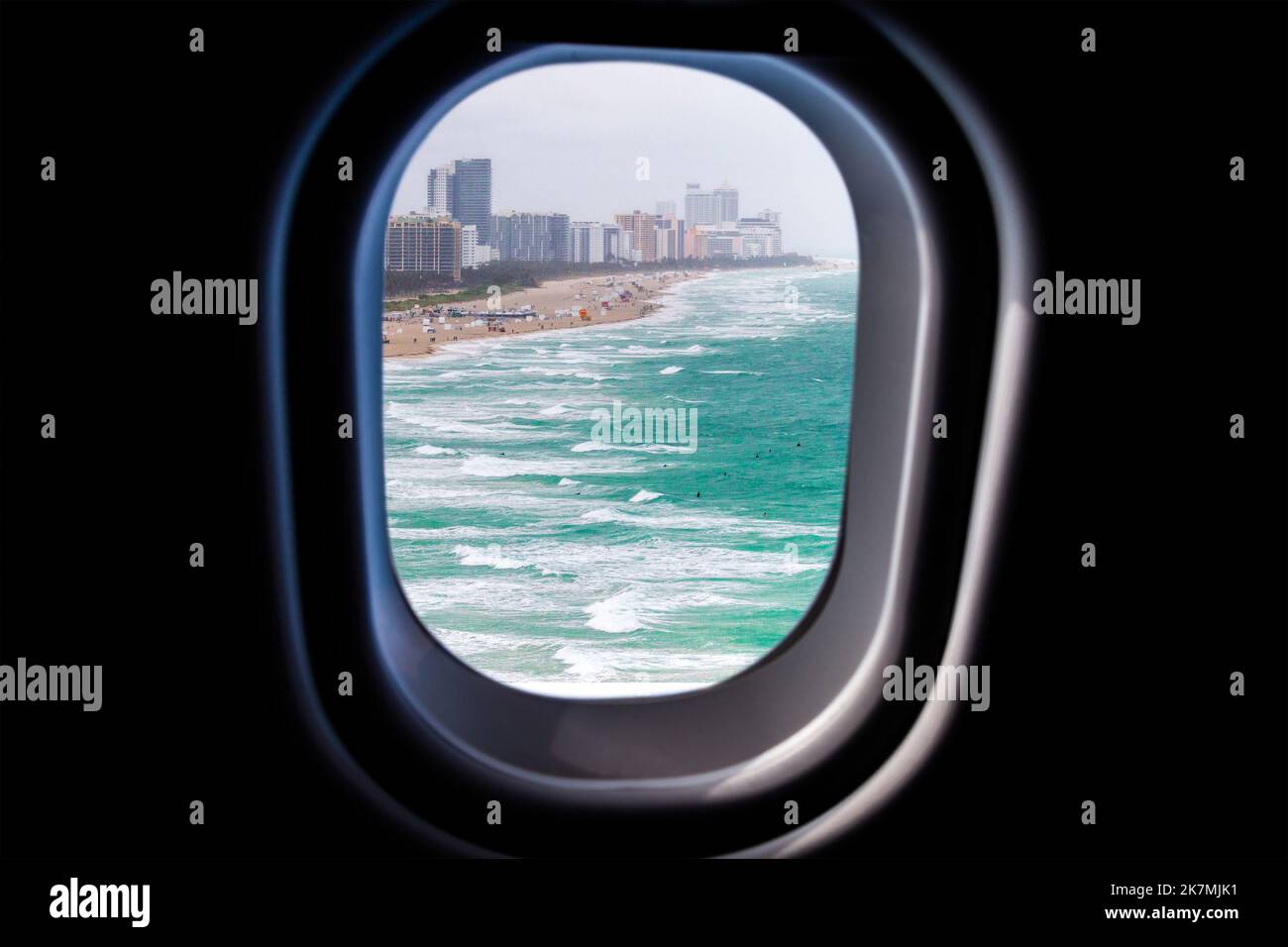 Miami beach view from plane window. View from a jet plane pothole high ...