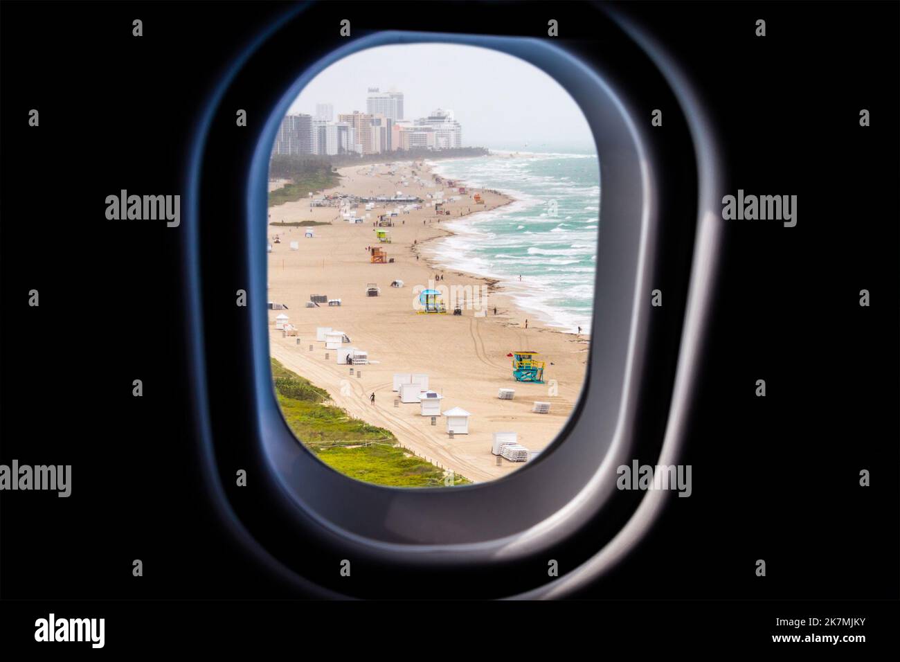Miami beach view from plane window. View from a jet plane pothole high ...
