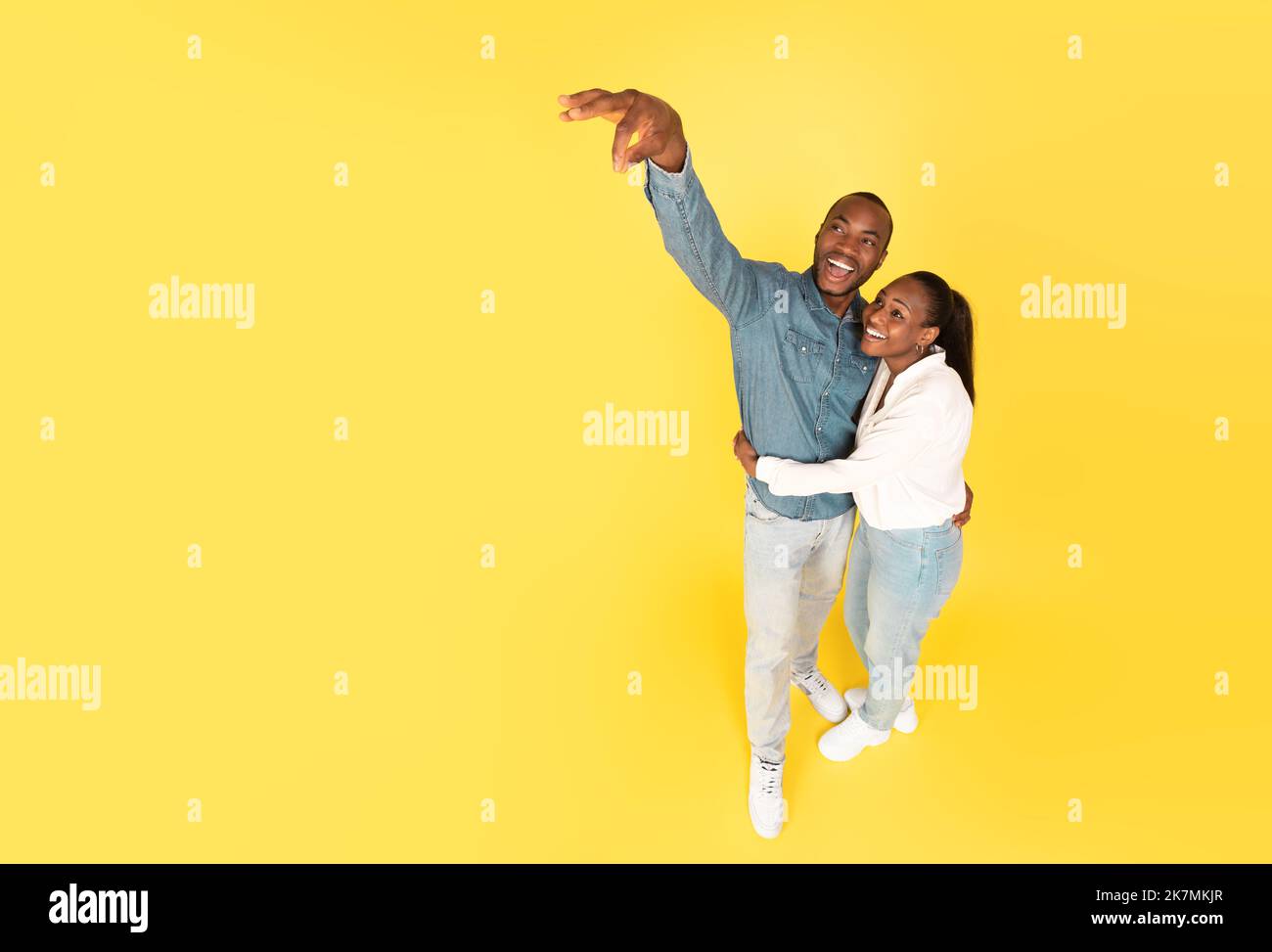 African American Spouses Advertising Something Holding Invisible Object ...