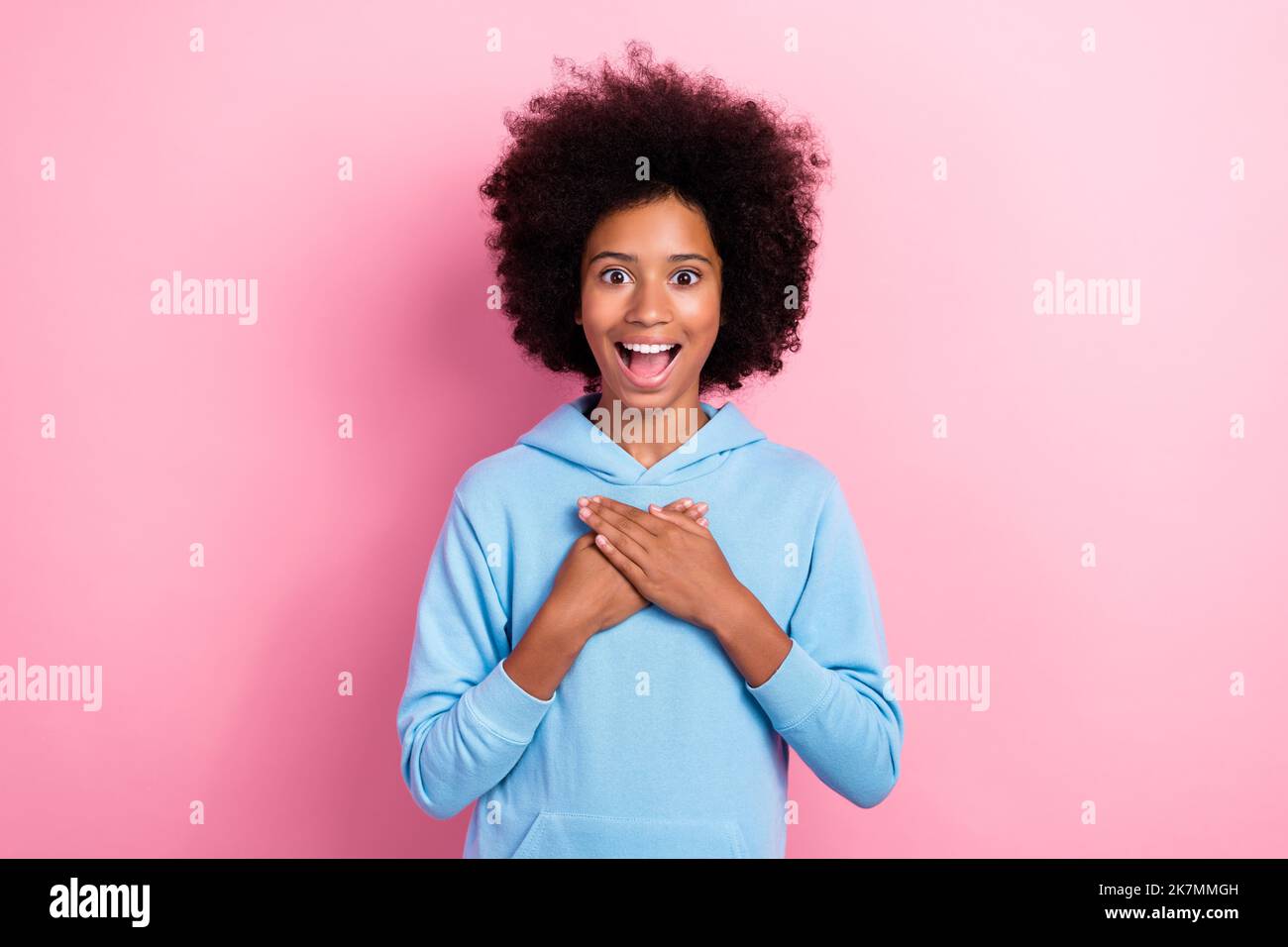 Photo of astonished funky person hands touch chest open mouth isolated ...