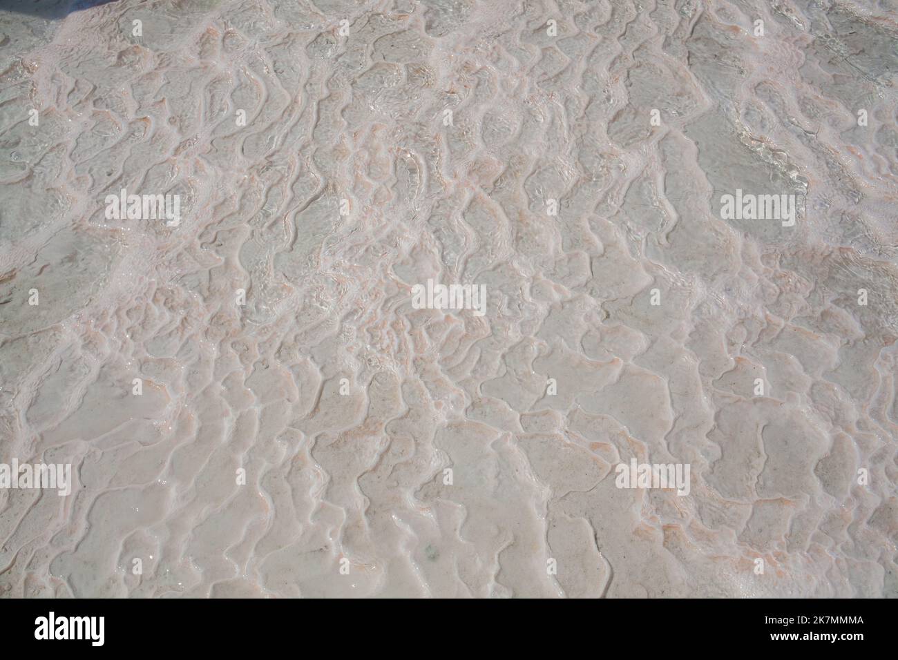 Limestone floor with water in Pamukkale calcium travertine in Turkey ...