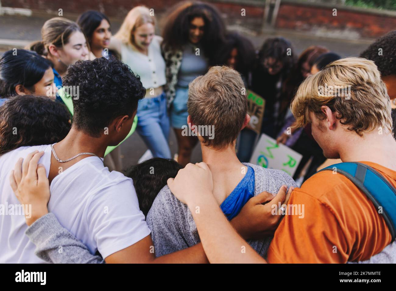 Diverse young people uniting against climate change. Group of ...