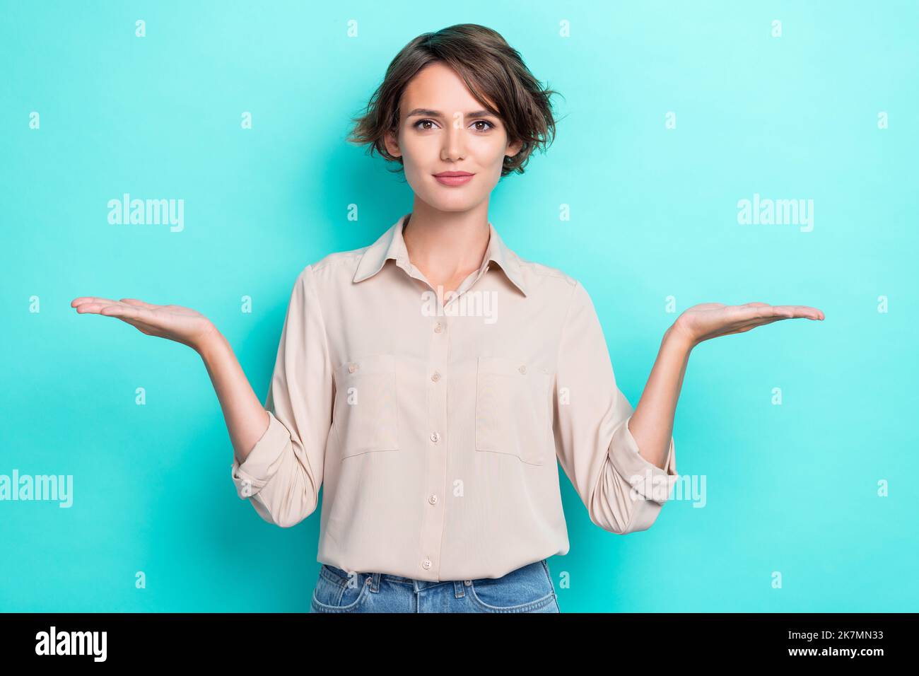 Photo of charming cute business worker woman bob brown hair hold palms ...