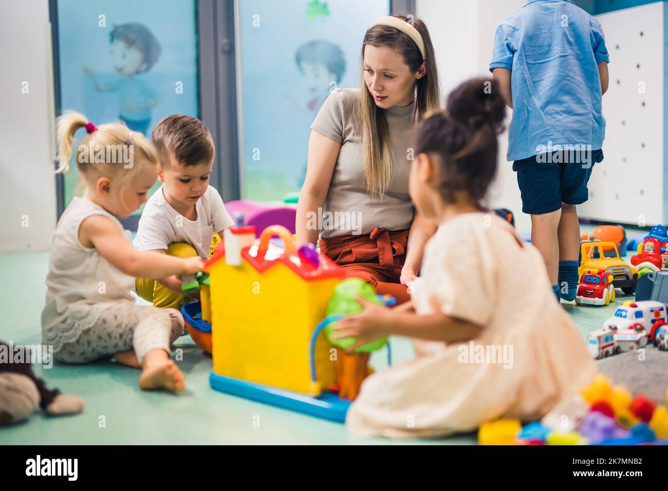 'we want to build a city, teacher' - Caucasian lovely kids having fun ...