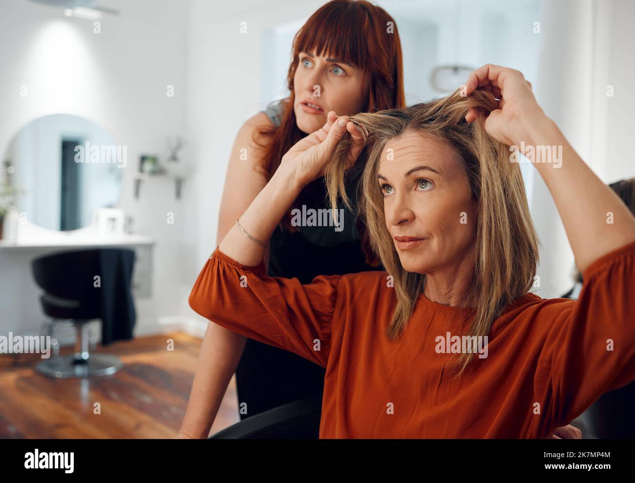 Women in hair salon, hairdresser client thinking of change and ...