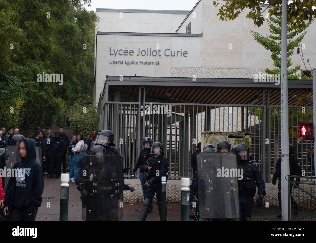 Nanterre, France. 18th Oct, 2022. Riot police detain youngsters after ...