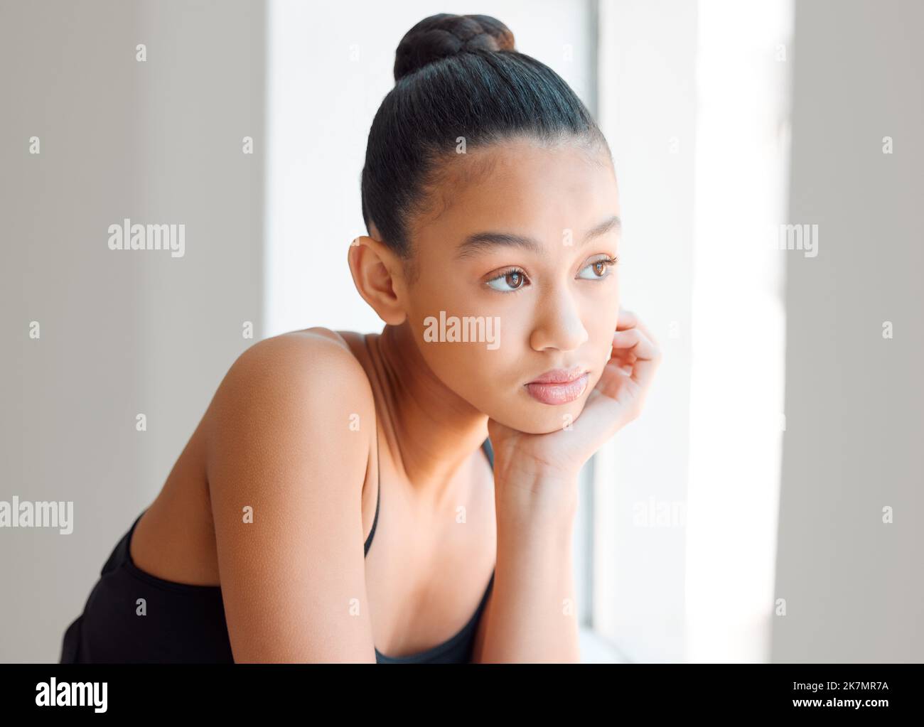 Falling into a state of greyness and numbness. Studio shot of a young ...