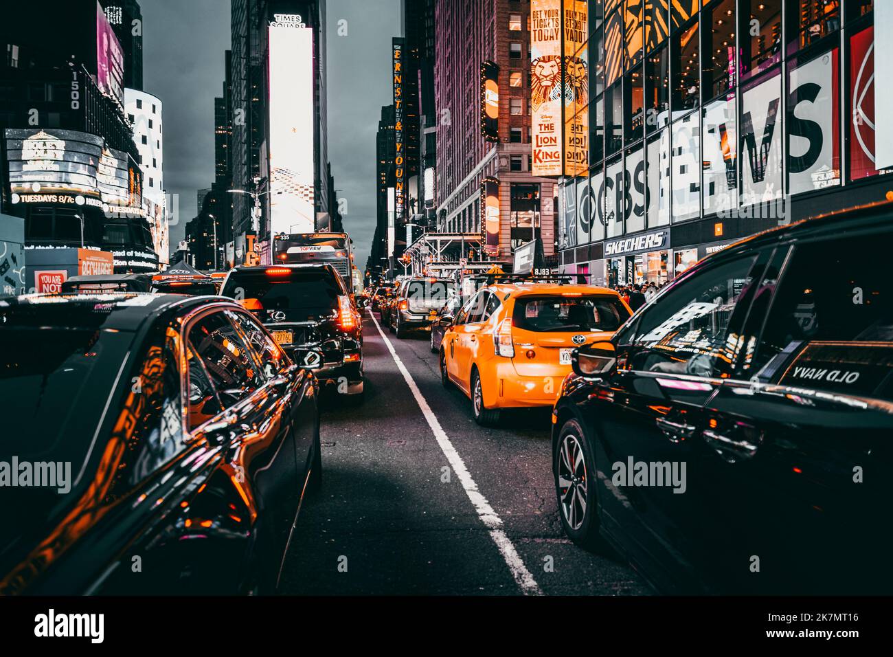 A vibrant shot of the Times Square New York City traffic jam and the ...