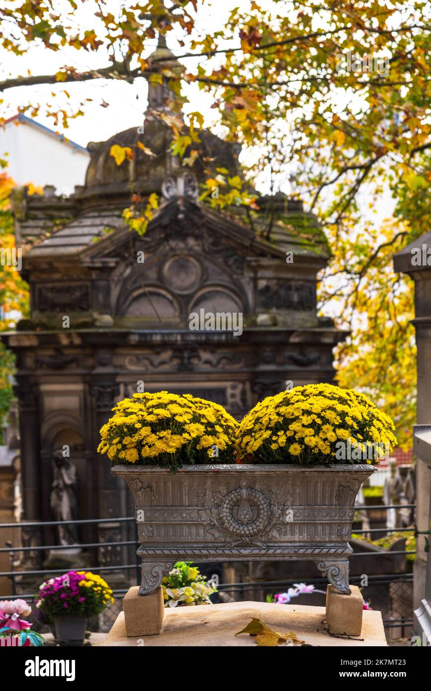 All Saints Day at old cemetery. Traditional memorial chrysanthemum ...