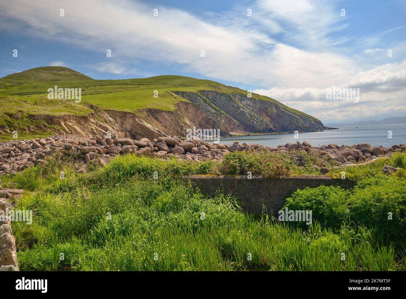 A beautiful landscape of stone piles at a beach on a sunny day Stock ...