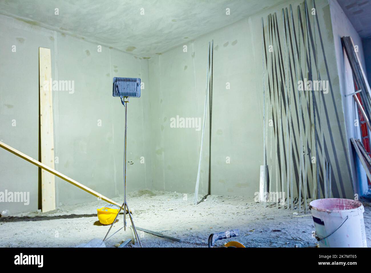 Switched on reflector casts light on the unfinished walls of ...