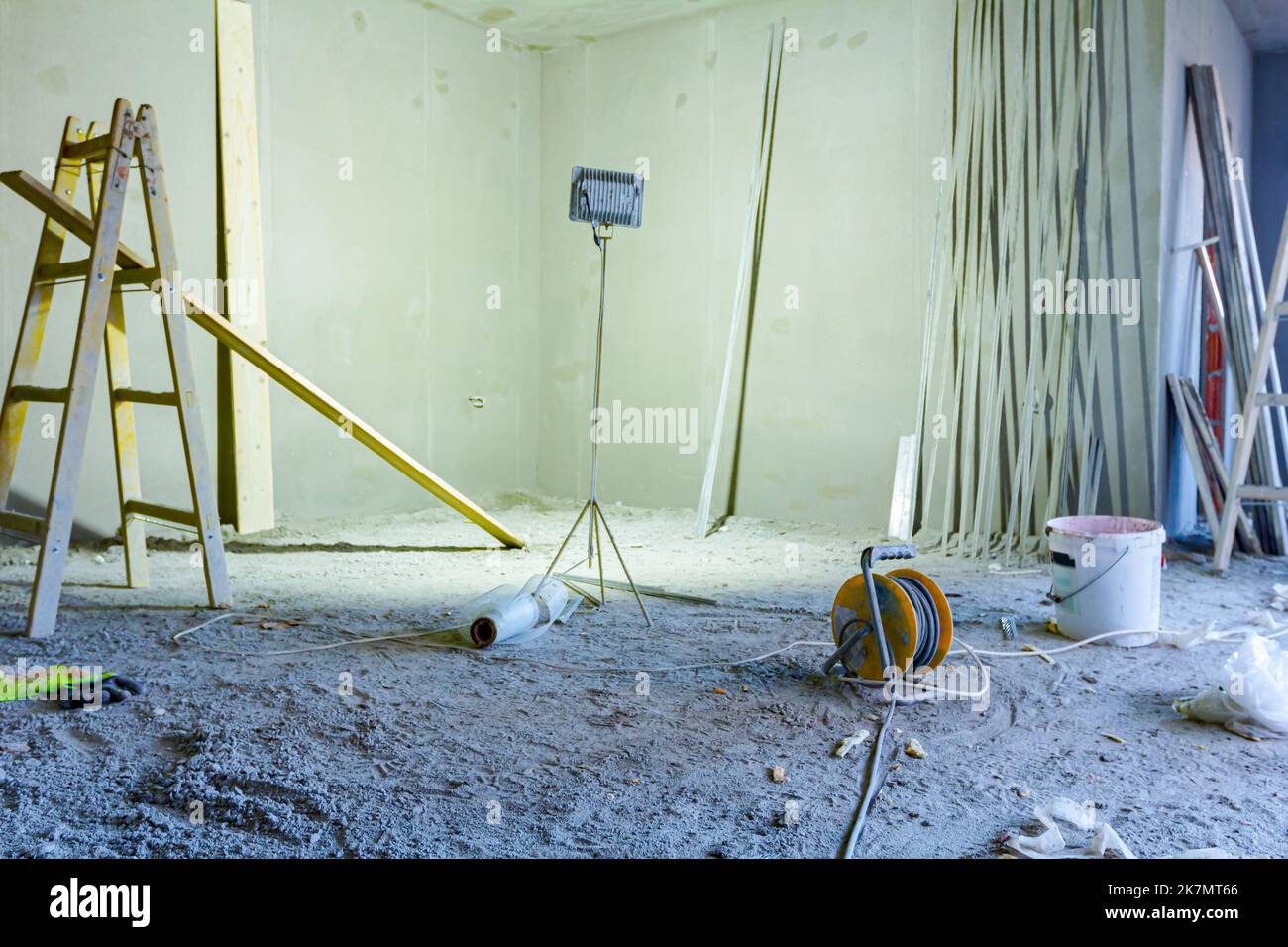 Switched on reflector casts light on the unfinished walls of ...