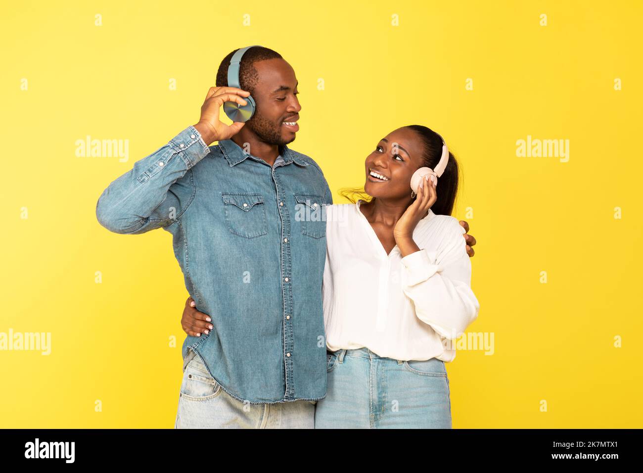 Happy Black Couple Listening To Music Wearing Headphones, Yellow ...