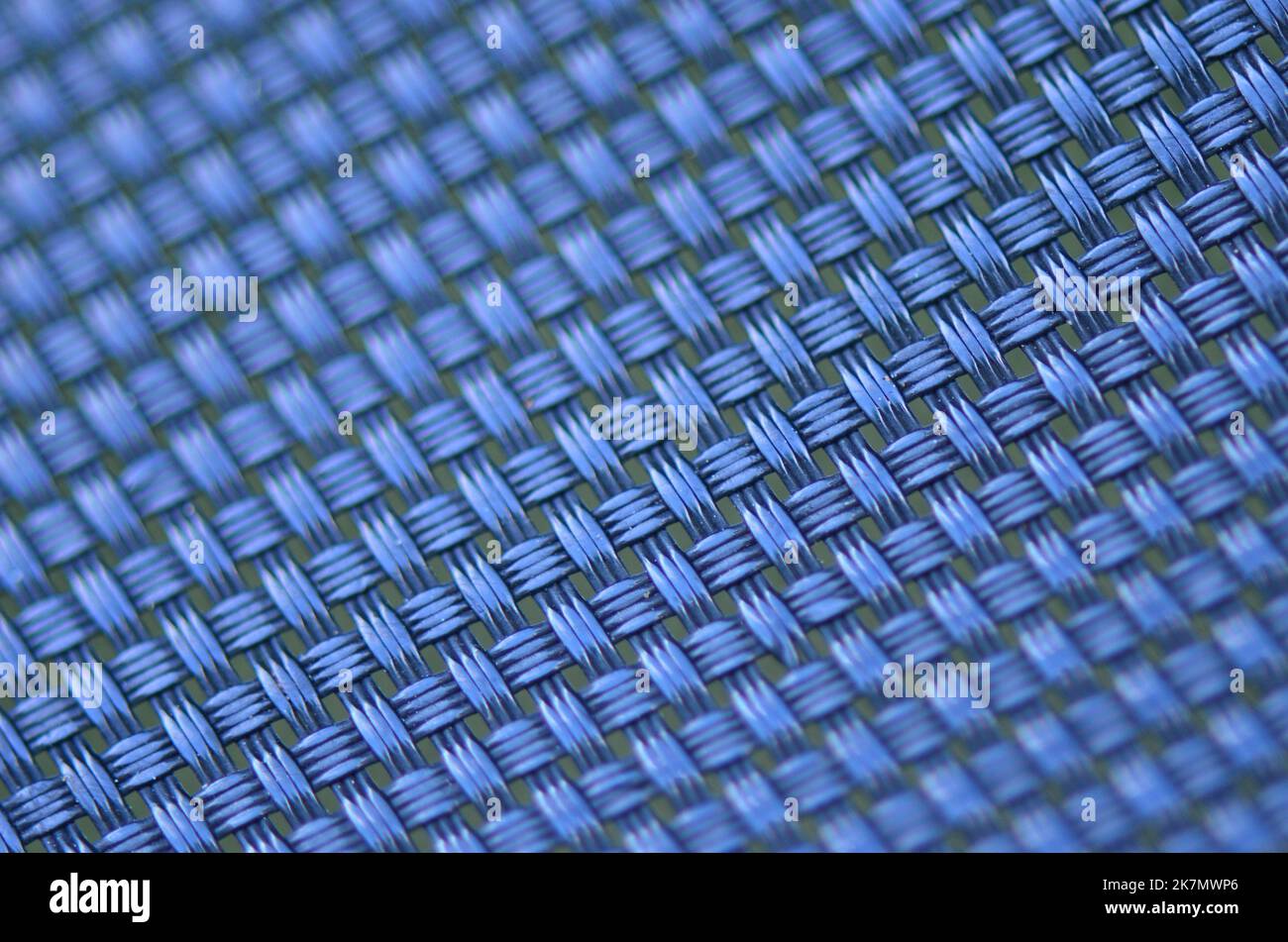 A blue synthetic rattan texture weaving background-used on outdoor ...