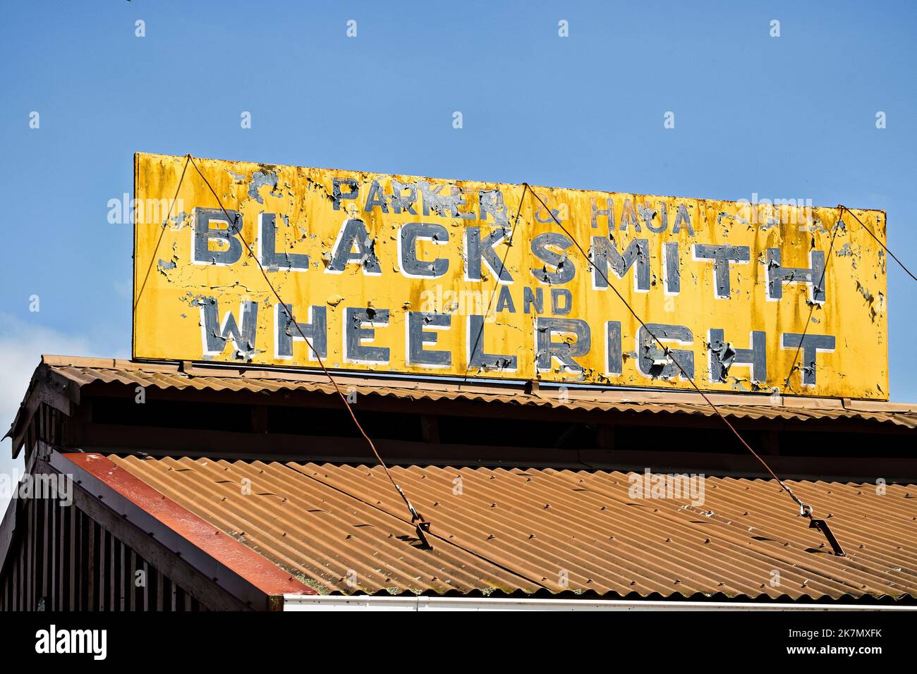 The Building sign for a blacksmith and wheelright at Tauranga Historic ...