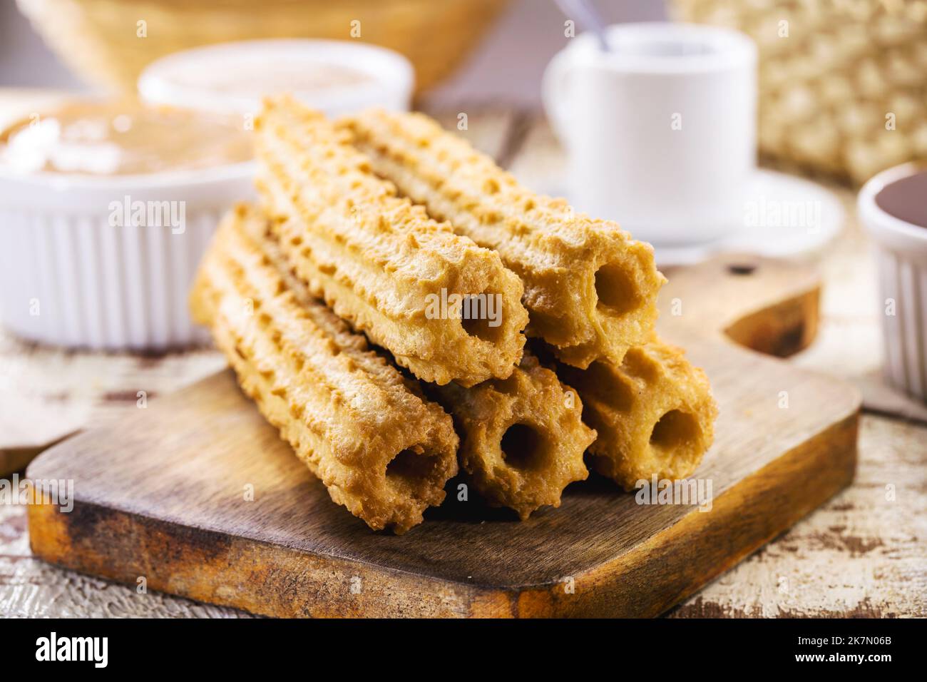 Churros, typical sweet from Brazil and America, fried and stuffed with ...