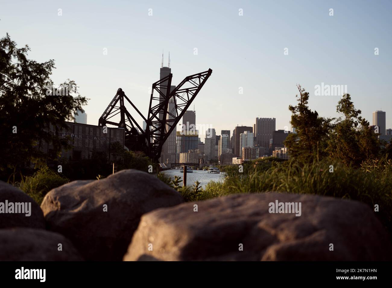 The St. Charles Air Line Bridge seen behind large rocks with Chicago ...