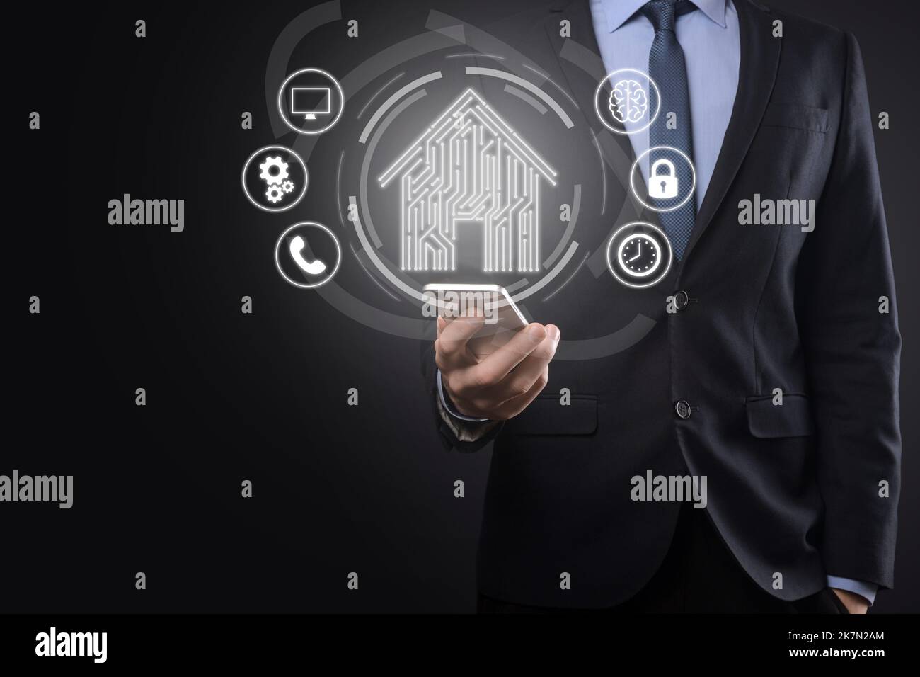 Businessman hold house icon.Smart home controlled, intelligent house ...