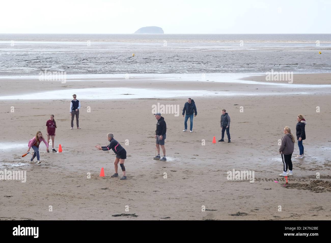 A family play beach games at Weston Super Mare Stock Photo - Alamy
