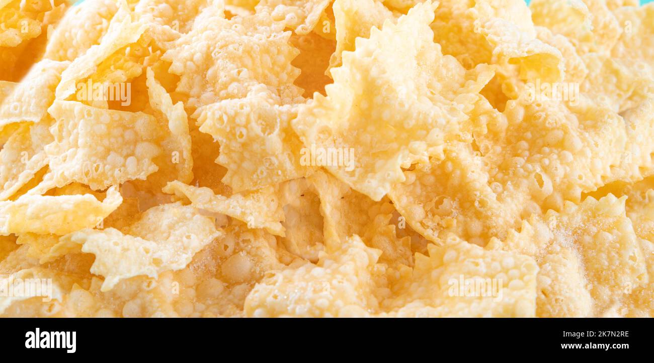 Sfrappole or chiachiere or angel wings background. Italian Carnival and ...