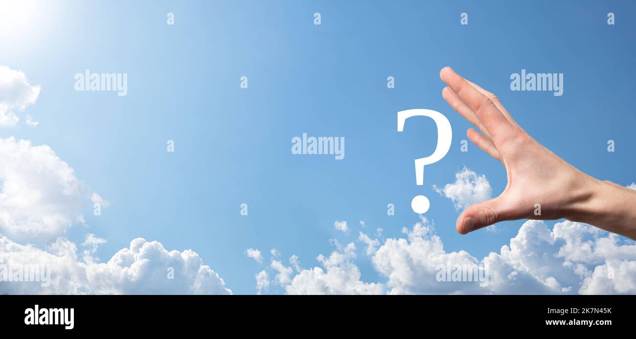 Businessman man hand hold interface question marks sign web. Ask ...