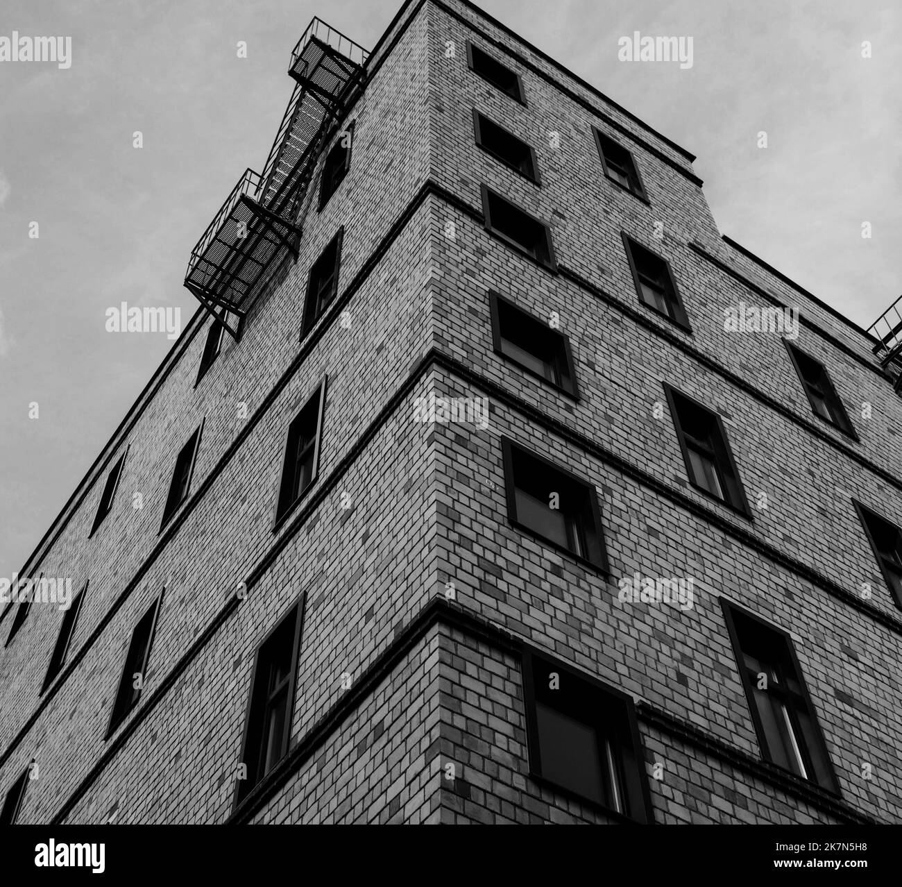 Brick wall architecture and blue sky. new modern european building ...