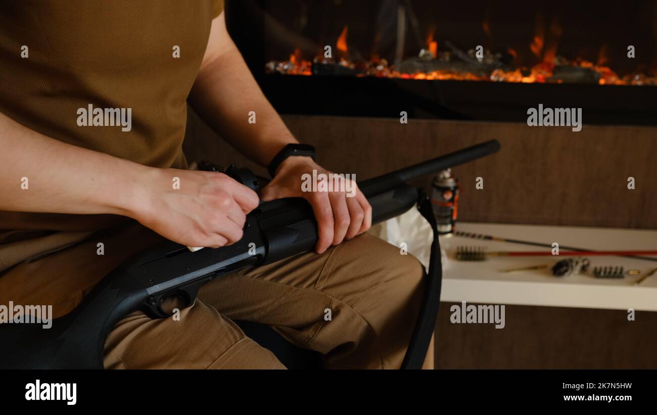 Gunsmith cleaning gun rifle assemble dismantle maintenance. Opening of ...