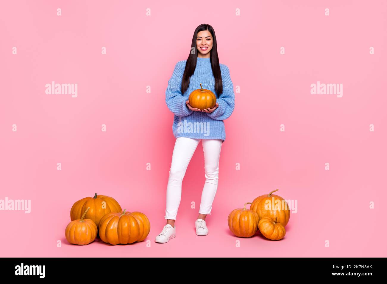 Full length body size view of attractive cheery girl holding fresh ...