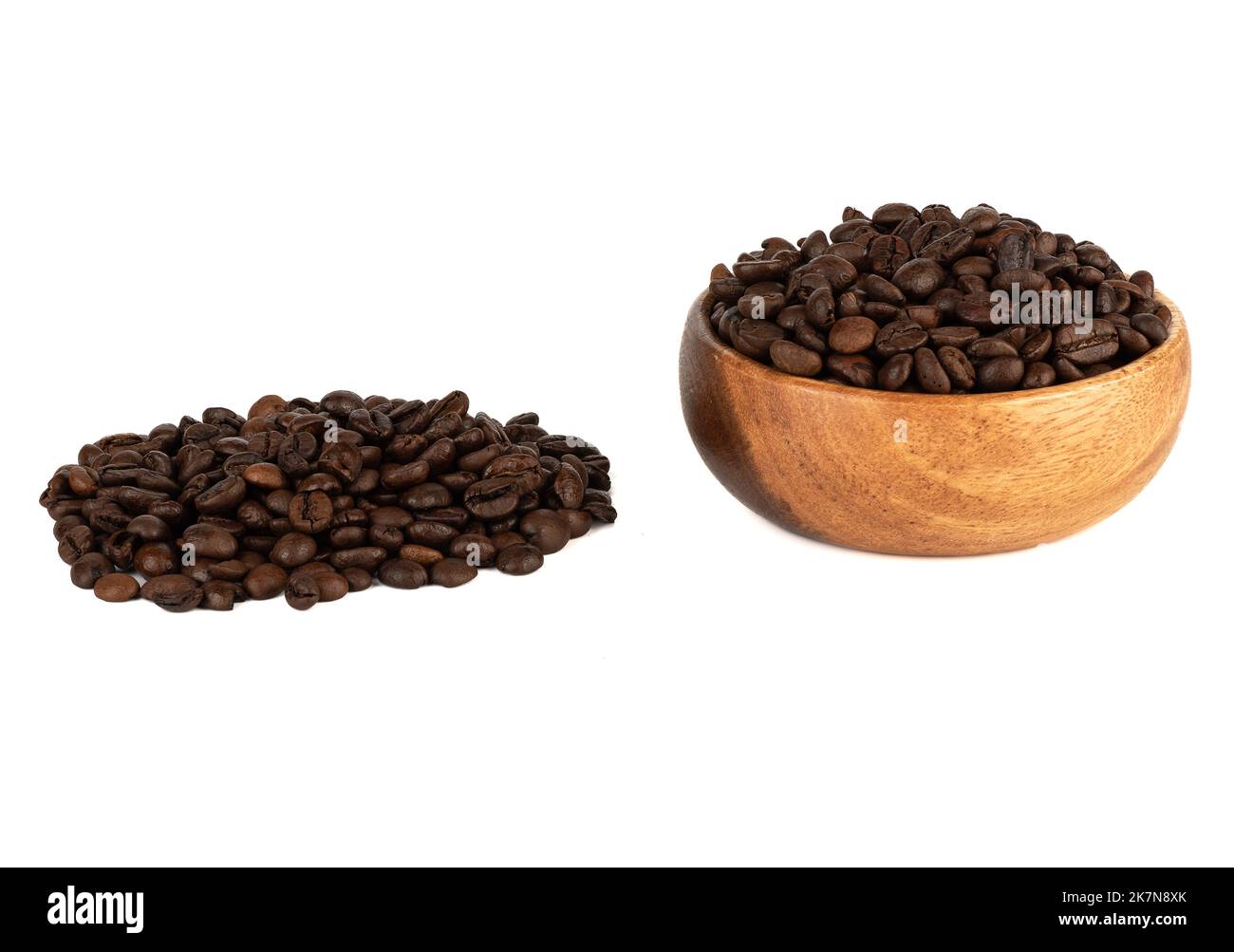 Freshly roasted Arabica and Robusta coffee beans on a white background ...