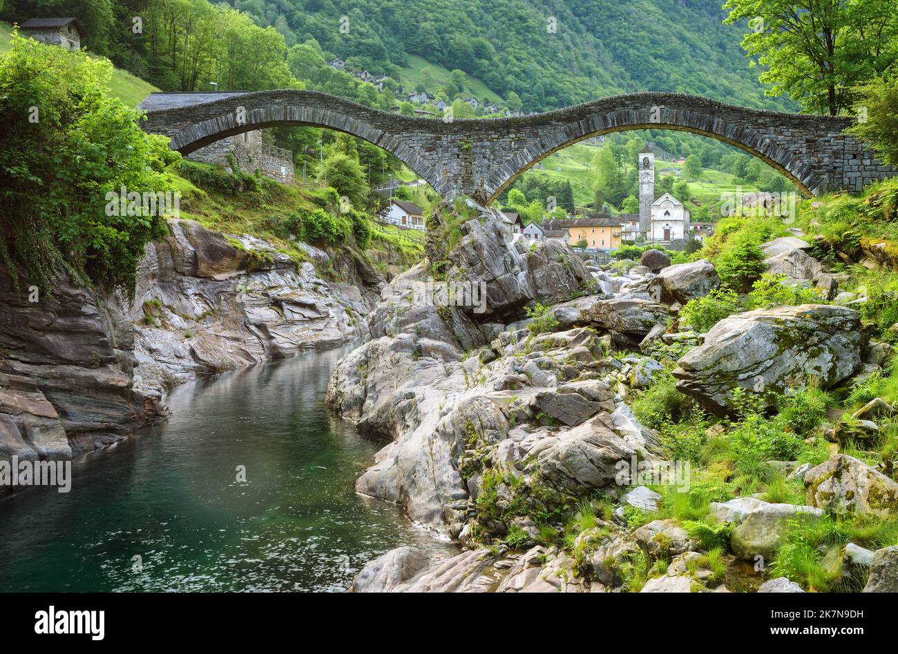 Old stone bridge and a church in the picturesque Lavertezzo village ...