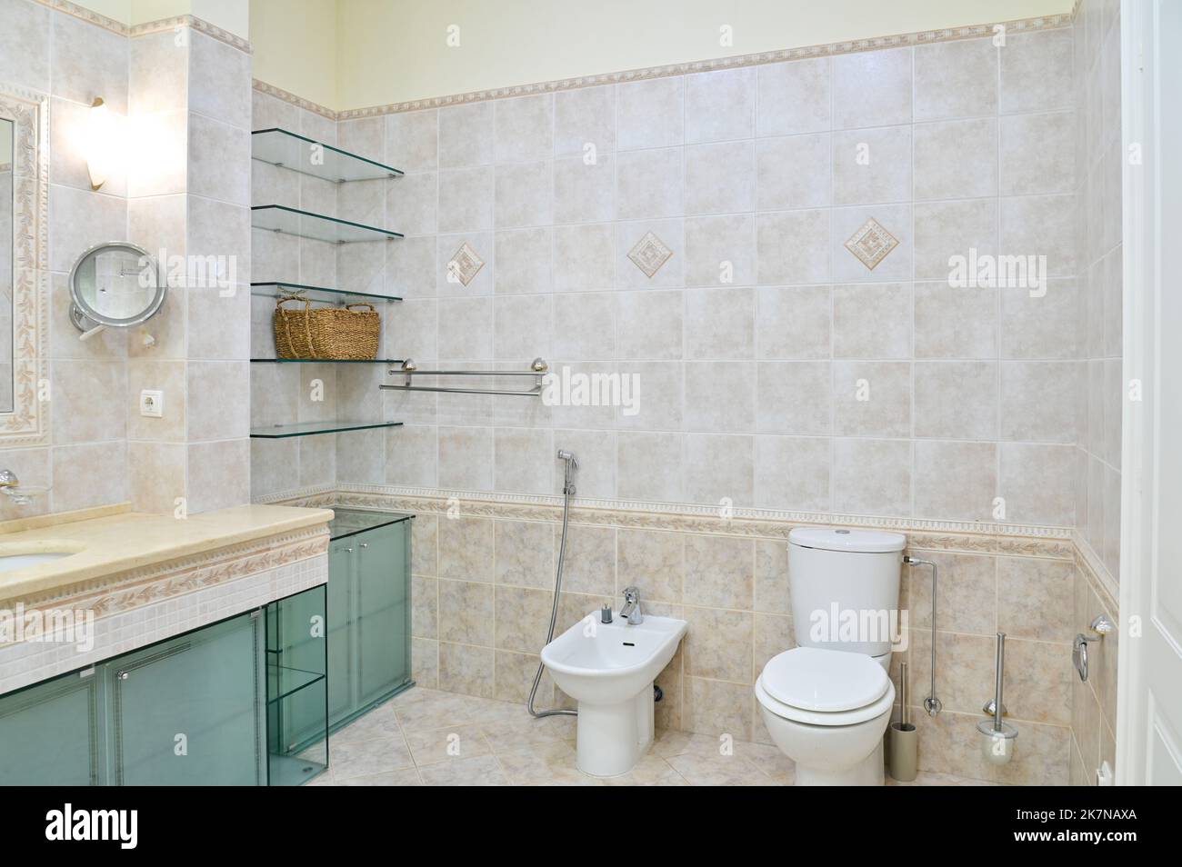 clean toilet room in a hotel room with a toilet and a bidet Stock Photo ...