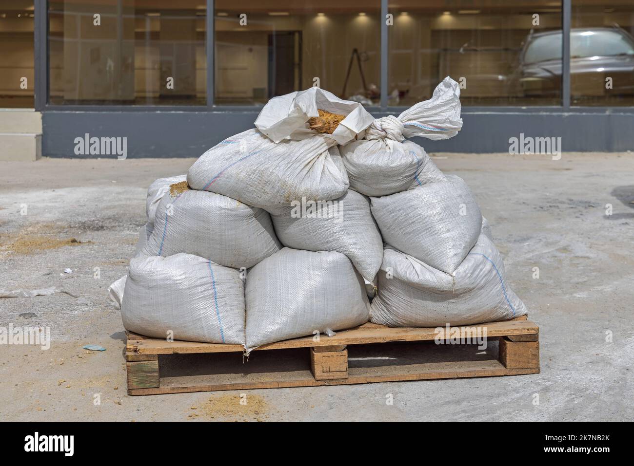 Many Bags Filled With Sand at Wooden Pallet Stock Photo - Alamy