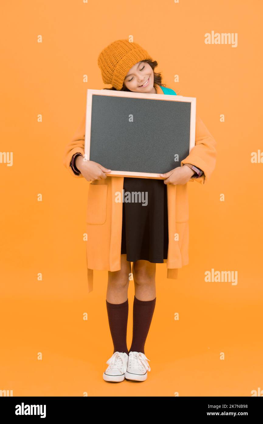 Ill do my own homework. Small child hold empty blackboard for homework ...