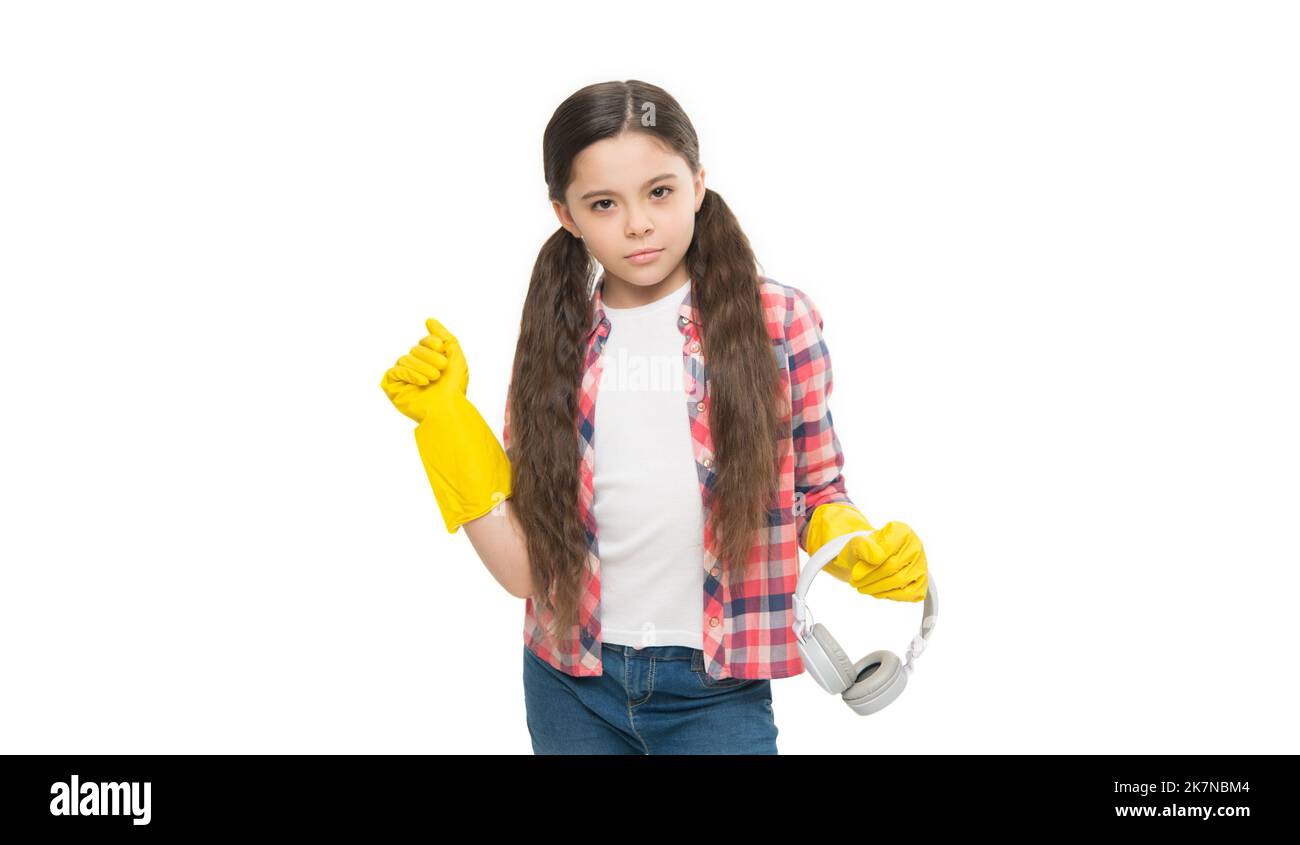 Cleaning routine. Girl wear headphones and gloves for cleaning. Instead ...