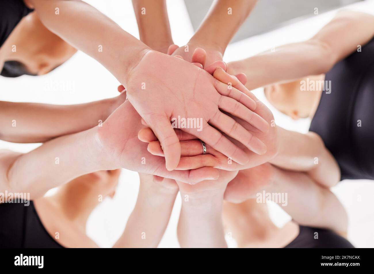 Together we can do this. a group of ballet dancers with their hands ...