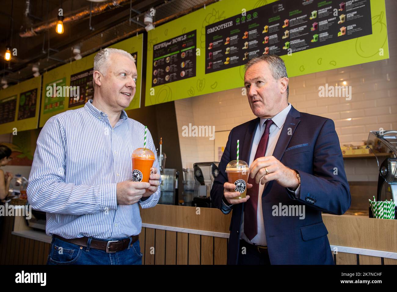 Northern Ireland Finance Minister Conor Murphy (right) with Andrew McQueen, Managing Director of ...