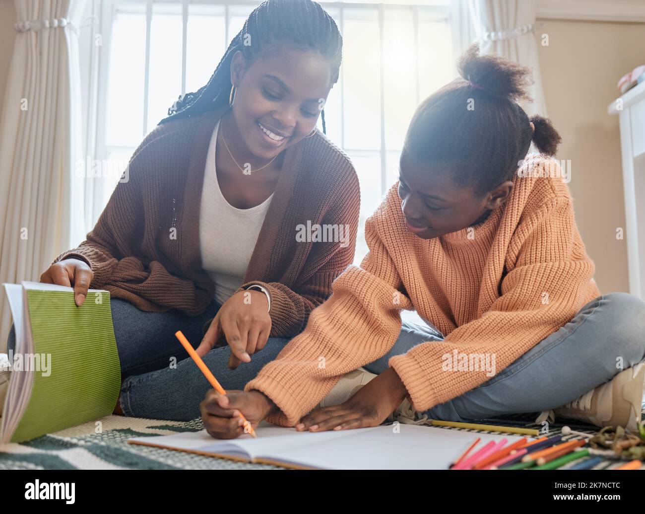 Its important to support your children. a young boy completing his ...
