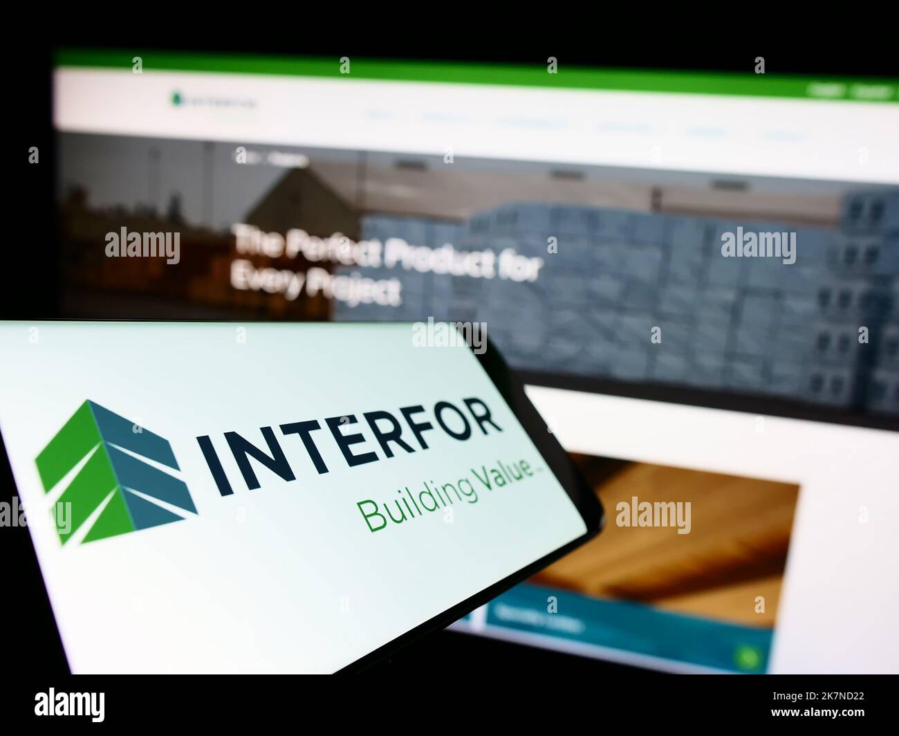 Smartphone with logo of Canadian forestry company Interfor Corporation ...