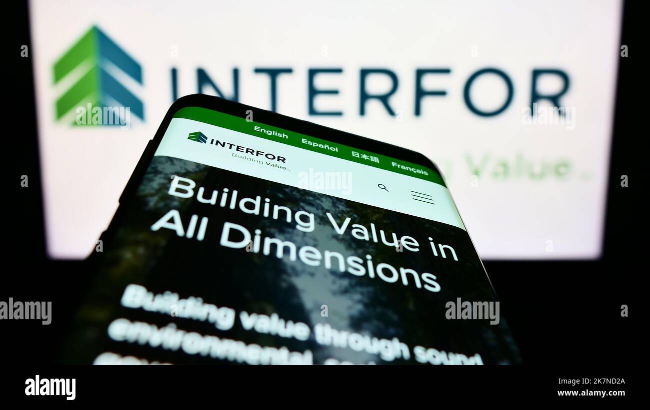 Mobile phone with website of Canadian forestry company Interfor ...