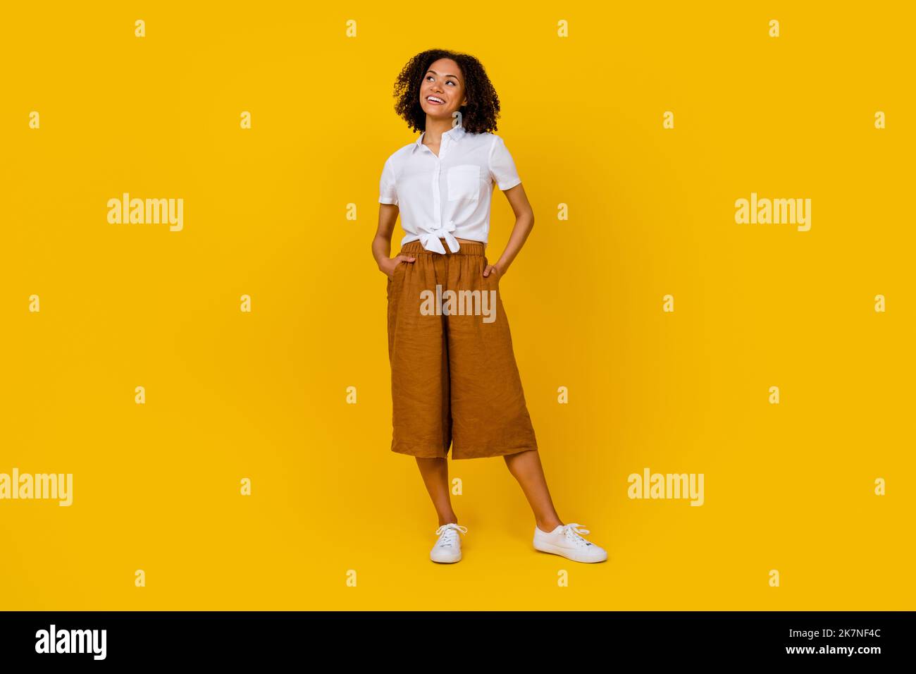 Full size photo of pretty mischief minded lady wavy hairdo has plan ...