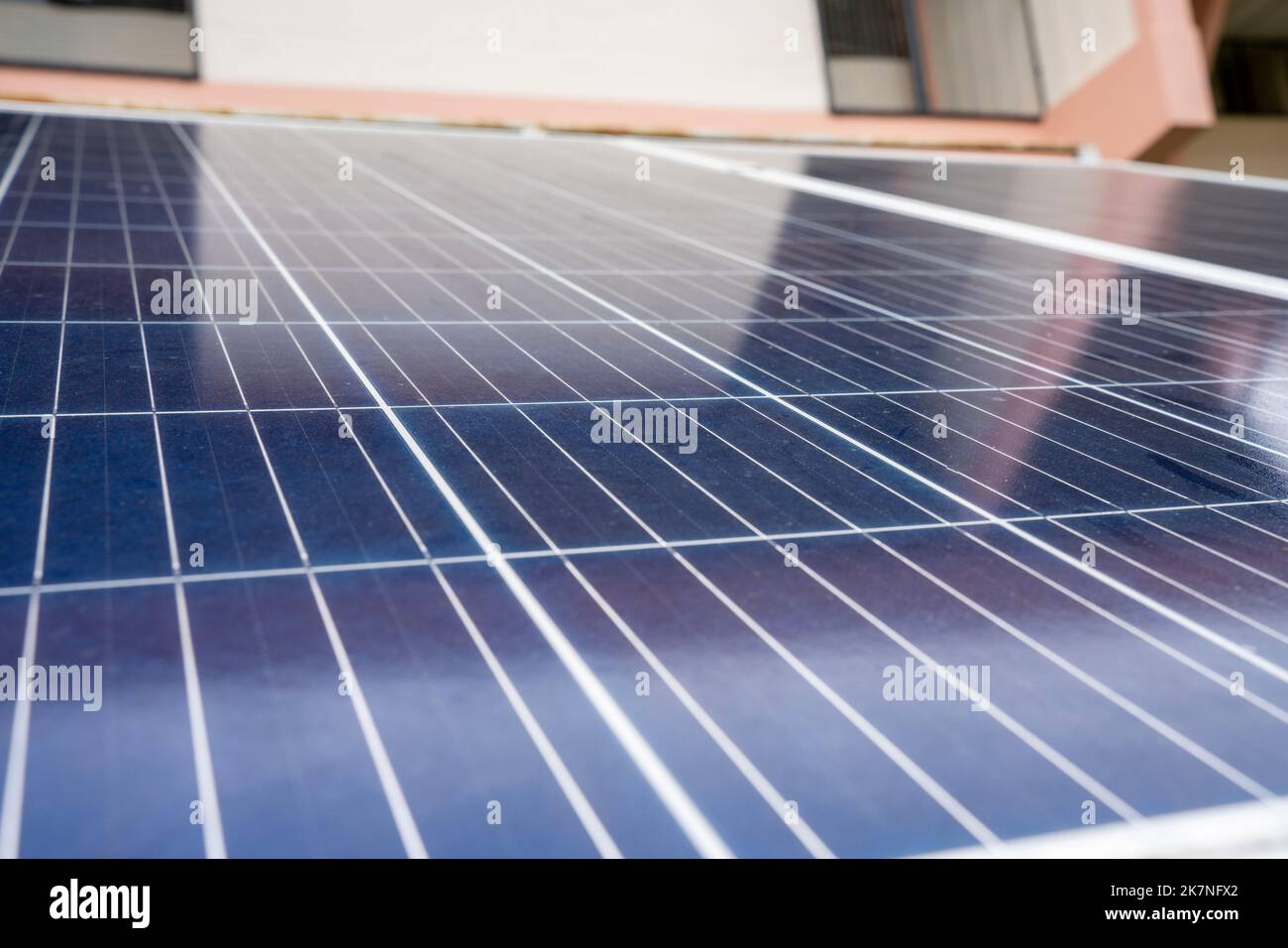 Blue Solar Photo voltaic panels system of apartment building on sunny ...