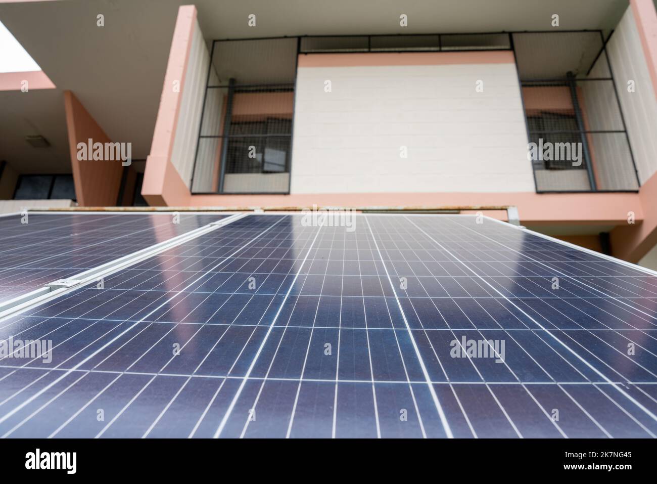 Blue Solar Photo voltaic panels system of apartment building on sunny ...