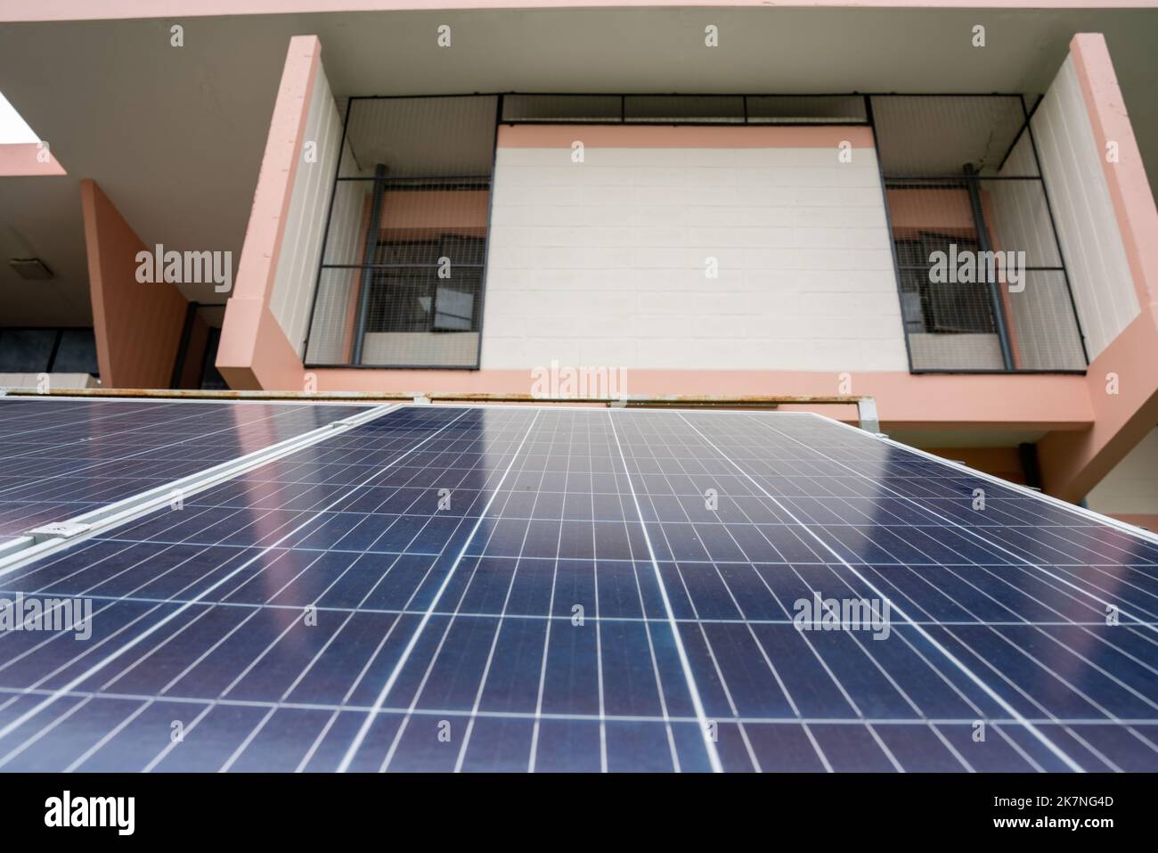 Blue Solar Photo voltaic panels system of apartment building on sunny ...