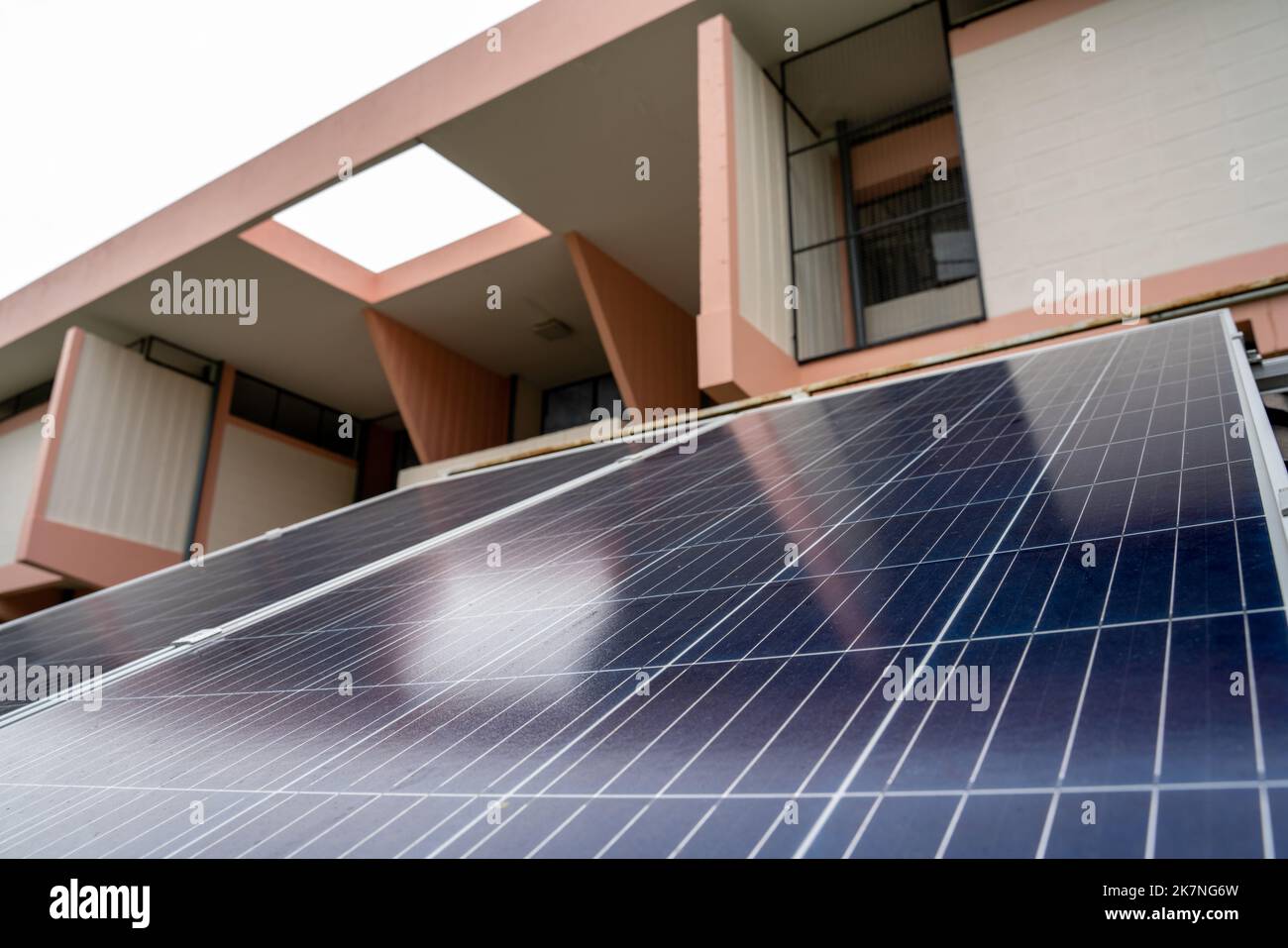 Blue Solar Photo voltaic panels system of apartment building on sunny ...