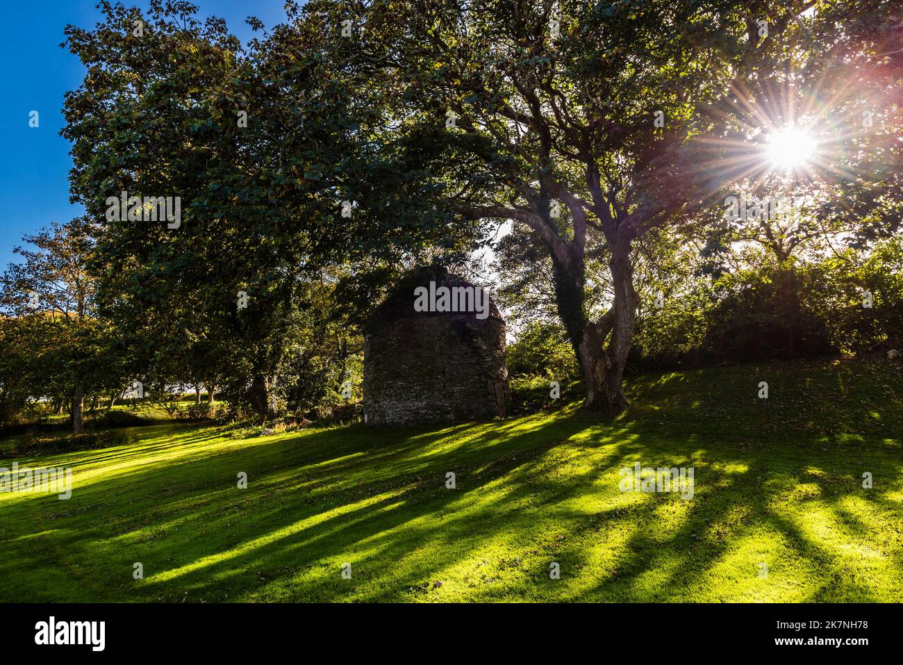 Setting sun over the medieval dovecote in the grounds of The Old ...