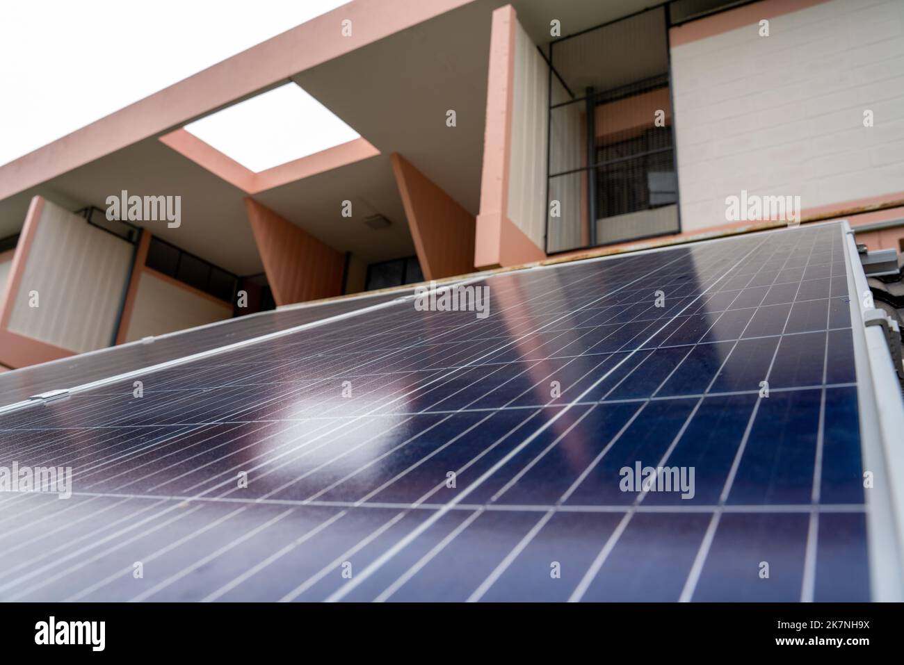 Blue Solar Photo voltaic panels system of apartment building on sunny ...