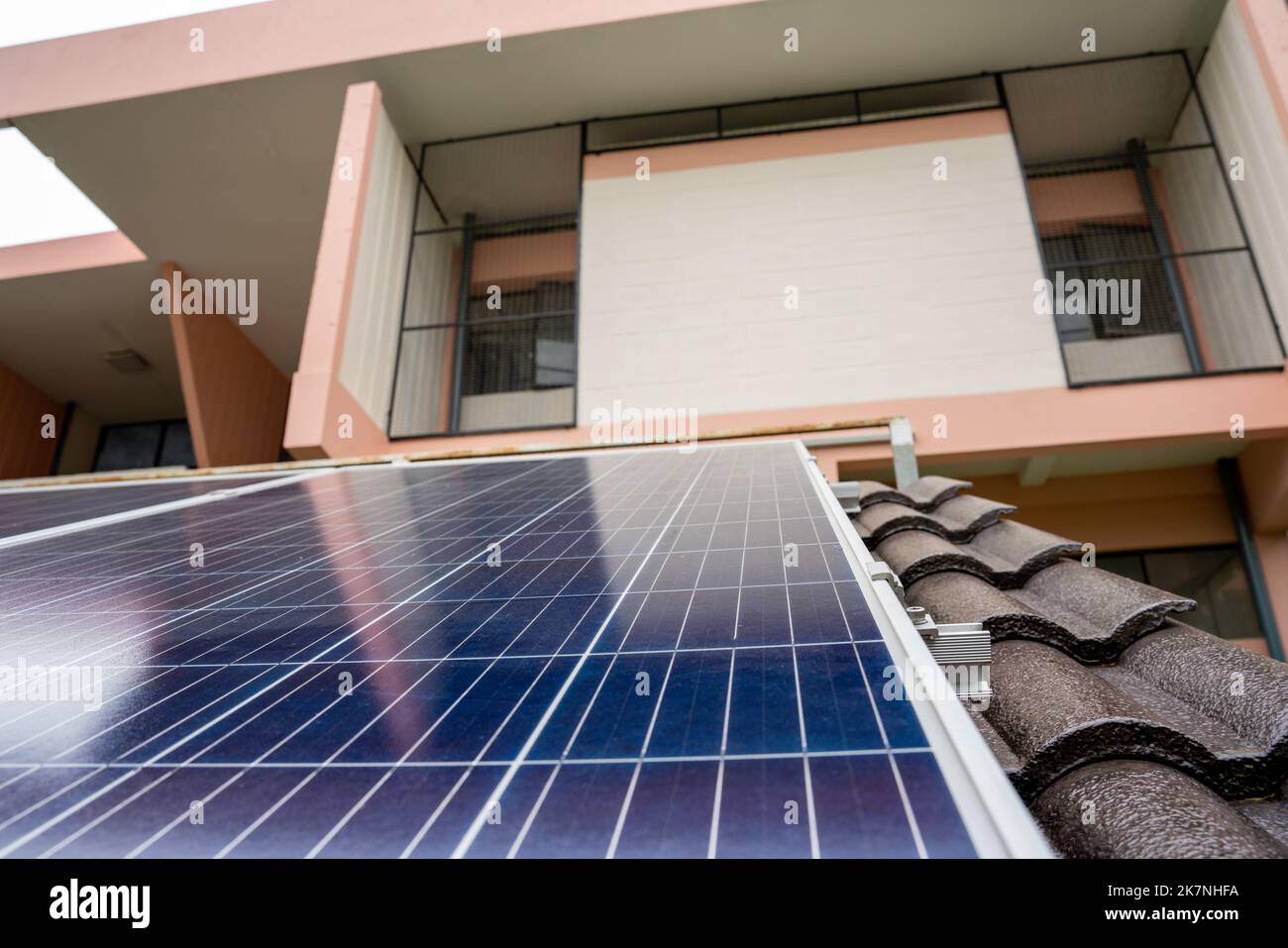 Blue Solar Photo voltaic panels system of apartment building on sunny ...