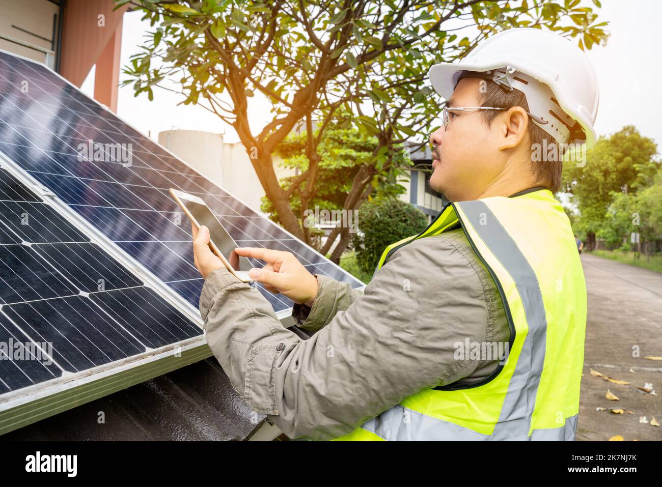 Blue Solar Photo voltaic panels system of apartment building on sunny ...