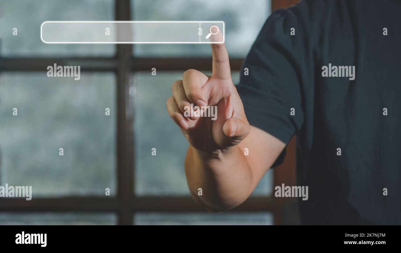 Hand of man touching searching browsing icon for internet data ...